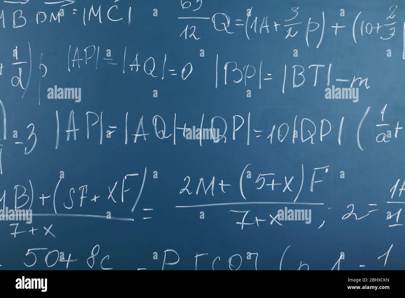 Maths formulas on chalkboard background Stock Photo - Alamy