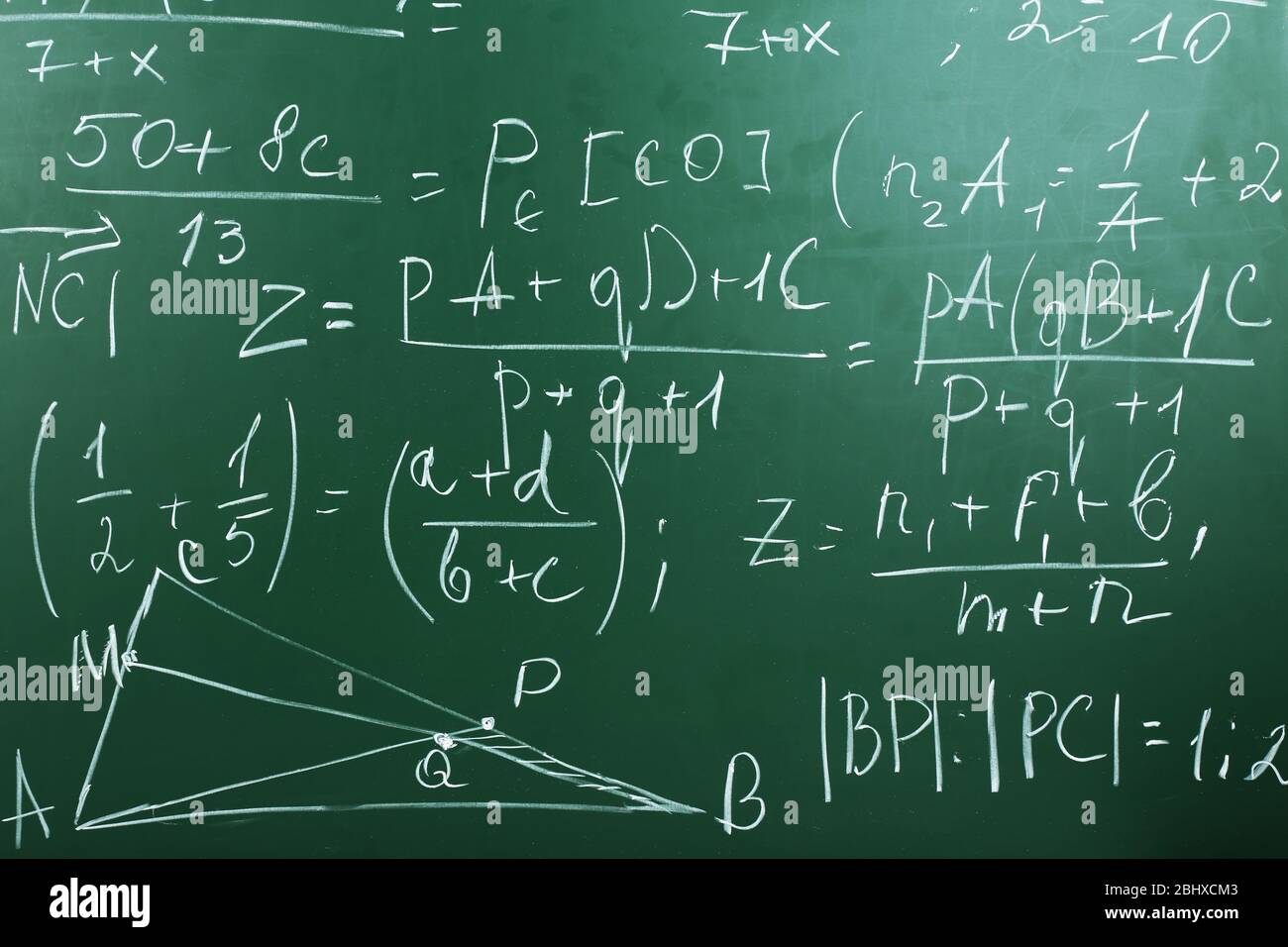 Maths formulas on chalkboard background Stock Photo - Alamy