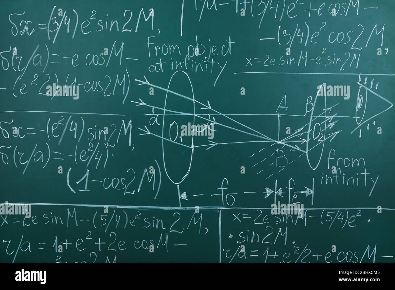 Maths formulas on chalkboard background Stock Photo - Alamy