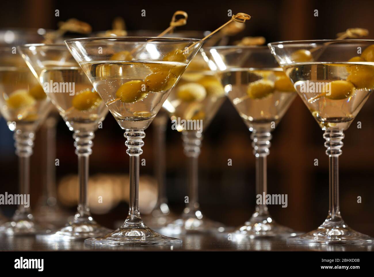 Glasses of cocktails on bar background Stock Photo - Alamy