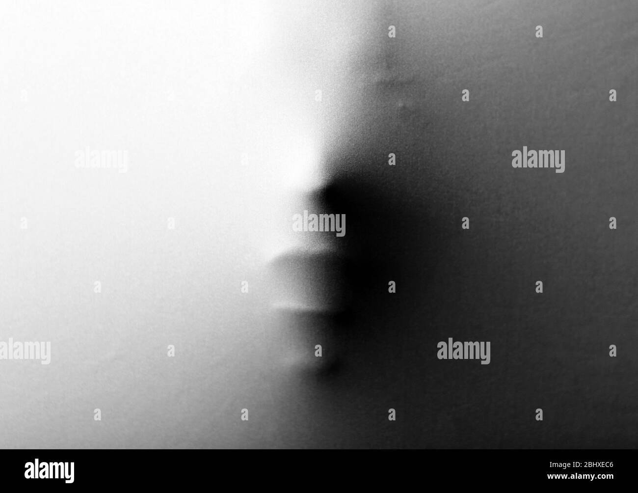 Screaming human face pressing through fabric as horror background Stock ...