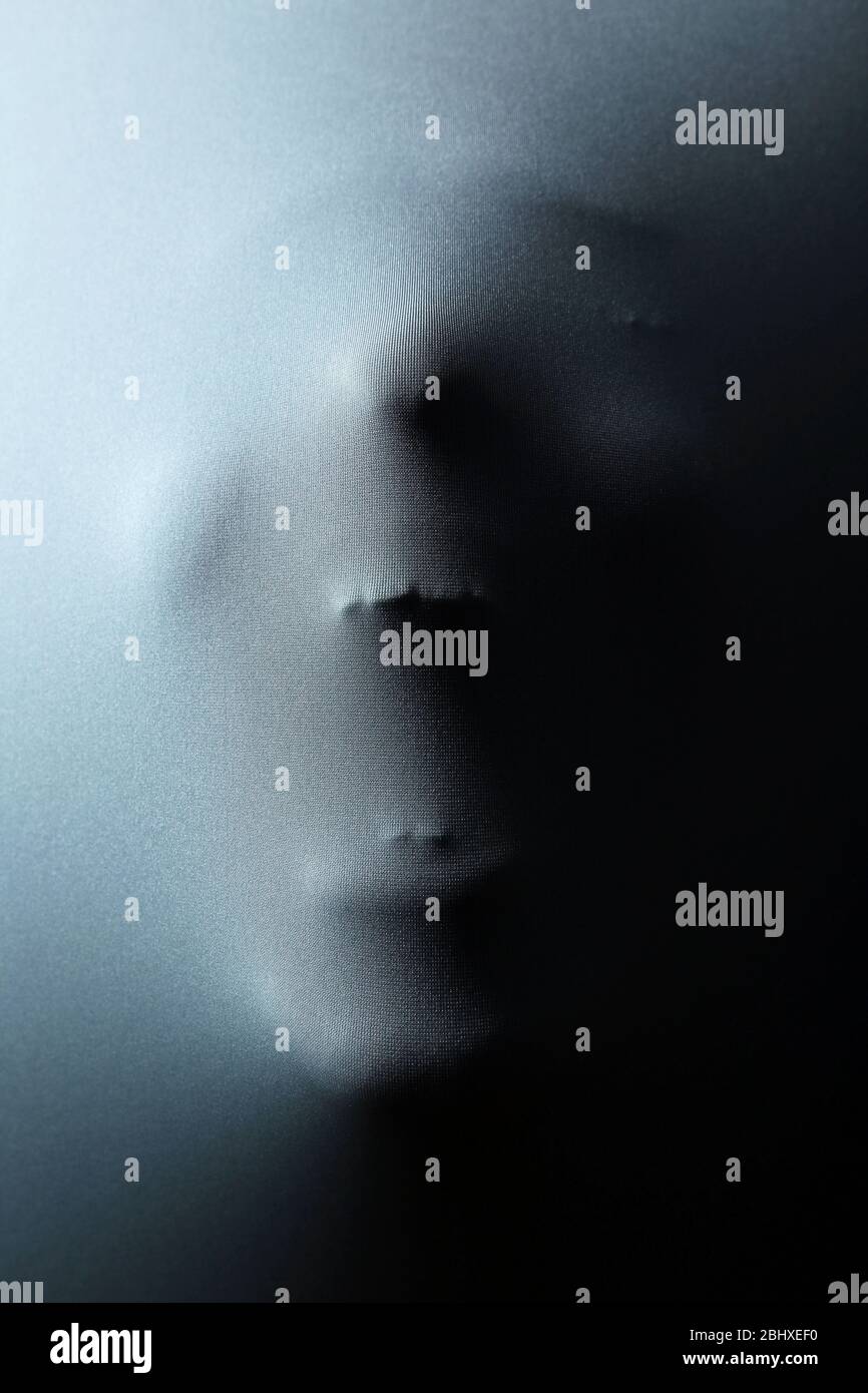 Screaming face through fabric hi-res stock photography and images - Alamy