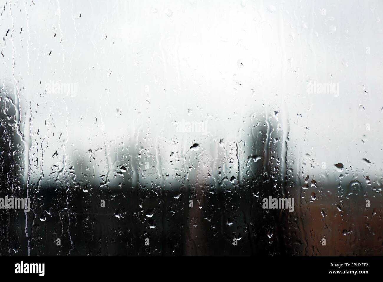 Raindrops on glass window Stock Photo - Alamy