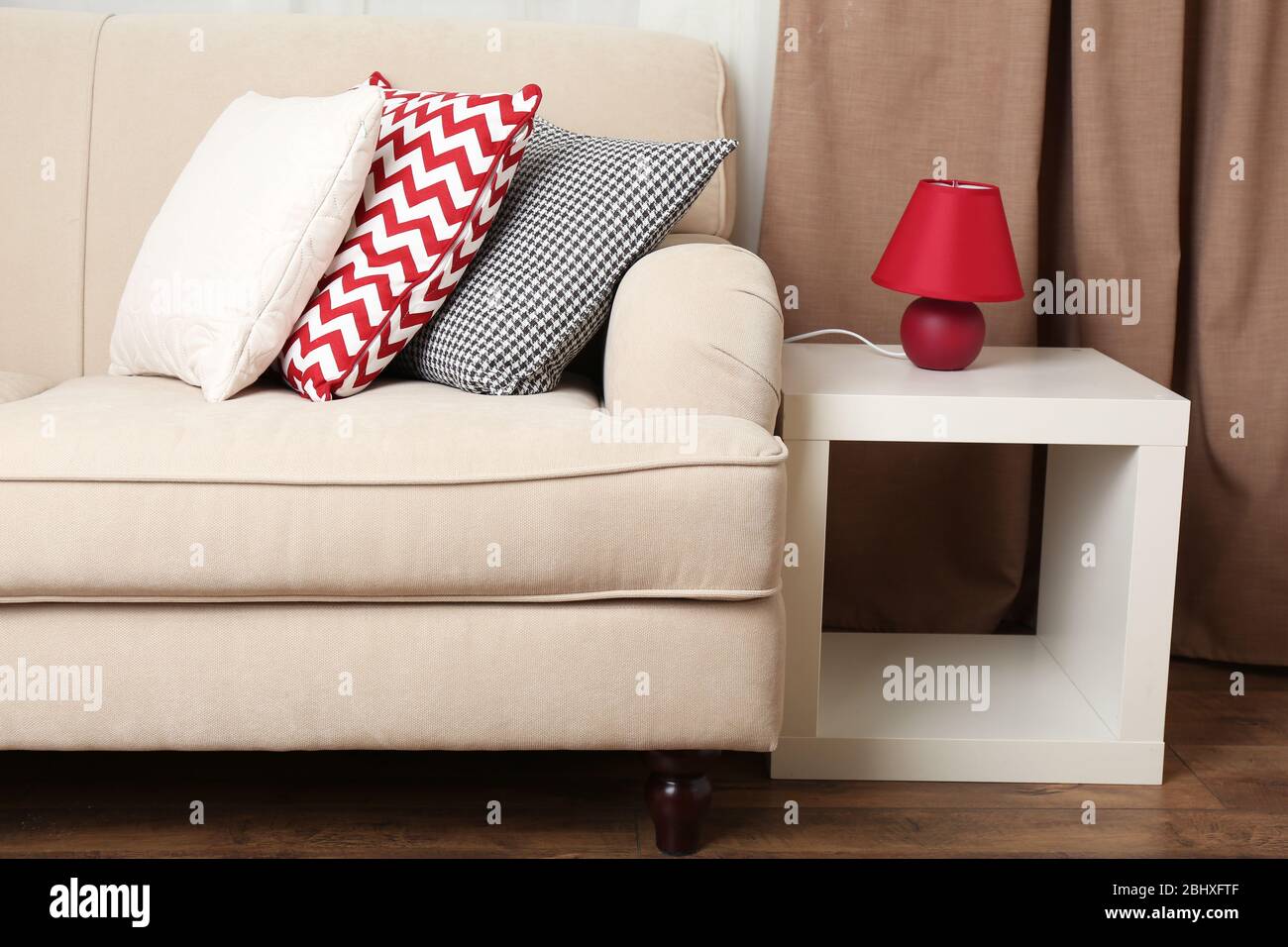 Modern interior with comfortable sofa in room Stock Photo - Alamy