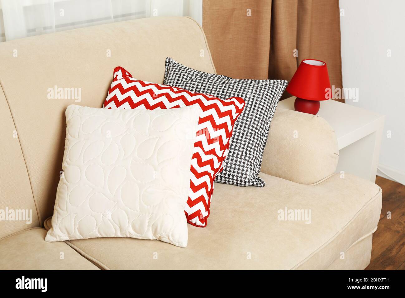 Modern interior with comfortable sofa in room Stock Photo - Alamy