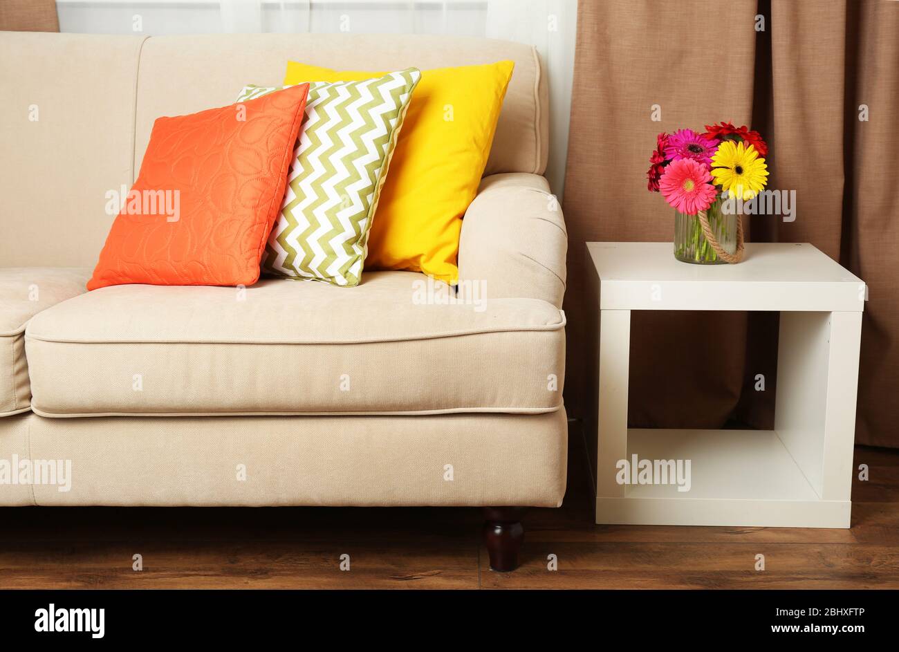 Modern interior with comfortable sofa in room Stock Photo - Alamy