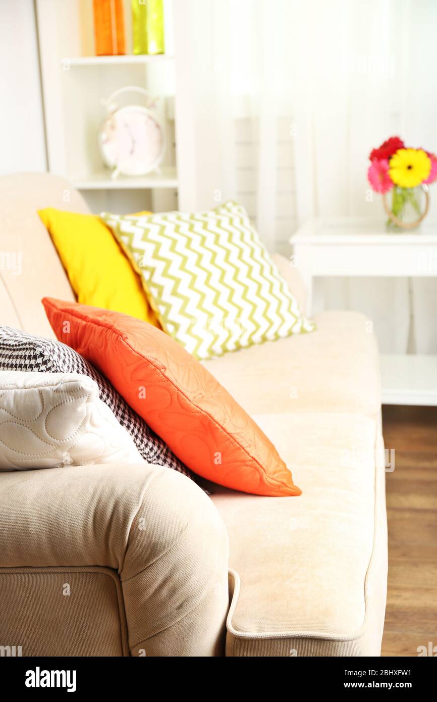 Modern interior with comfortable sofa in room Stock Photo - Alamy
