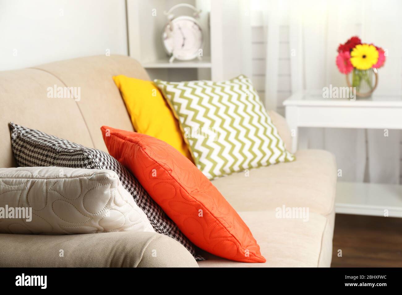 Modern interior with comfortable sofa in room Stock Photo - Alamy