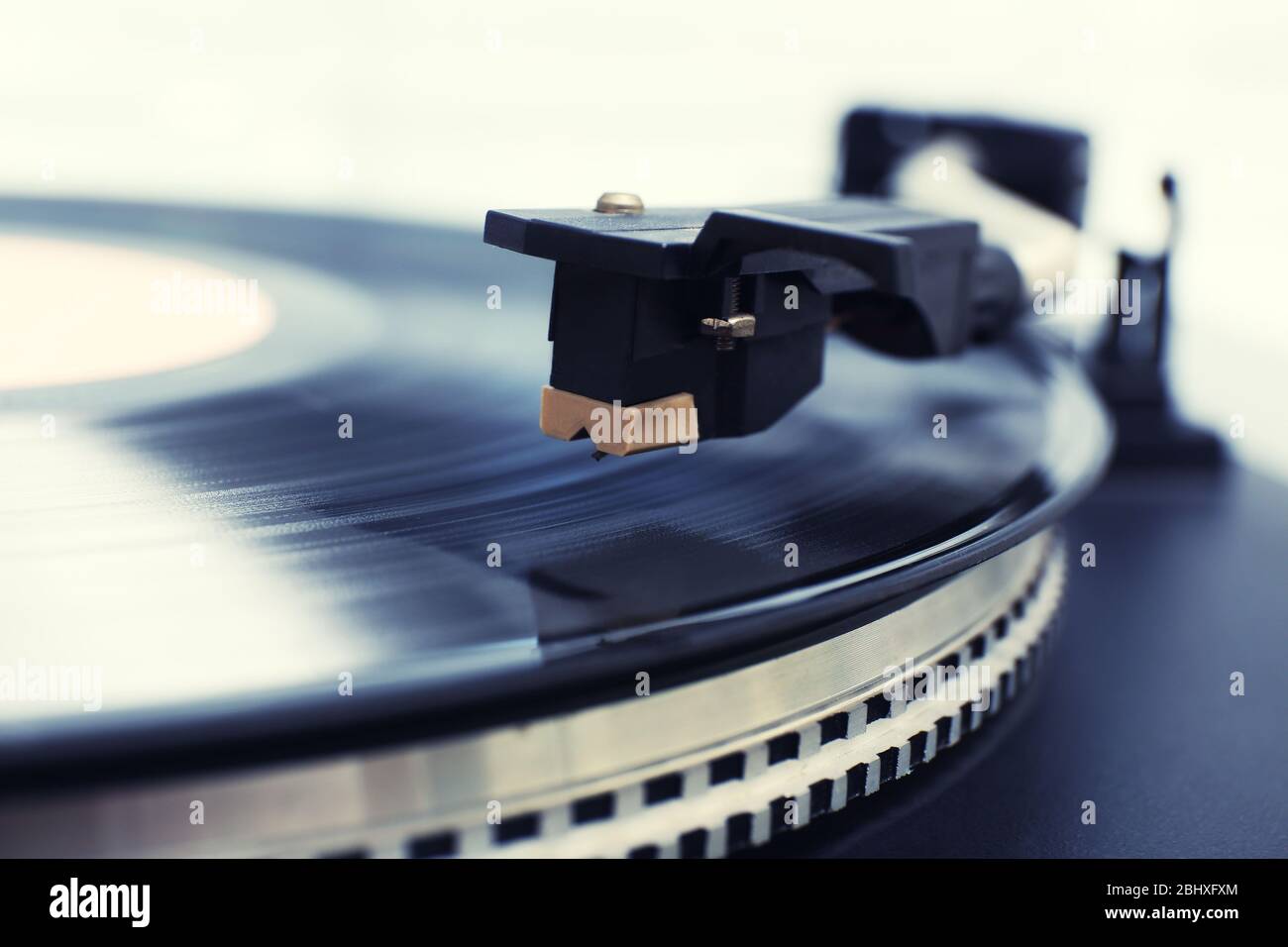 Gramophone with a vinyl record, closeup Stock Photo - Alamy