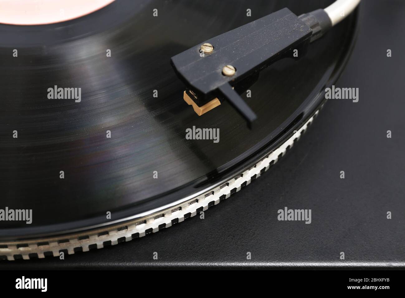 Gramophone with a vinyl record, closeup Stock Photo - Alamy