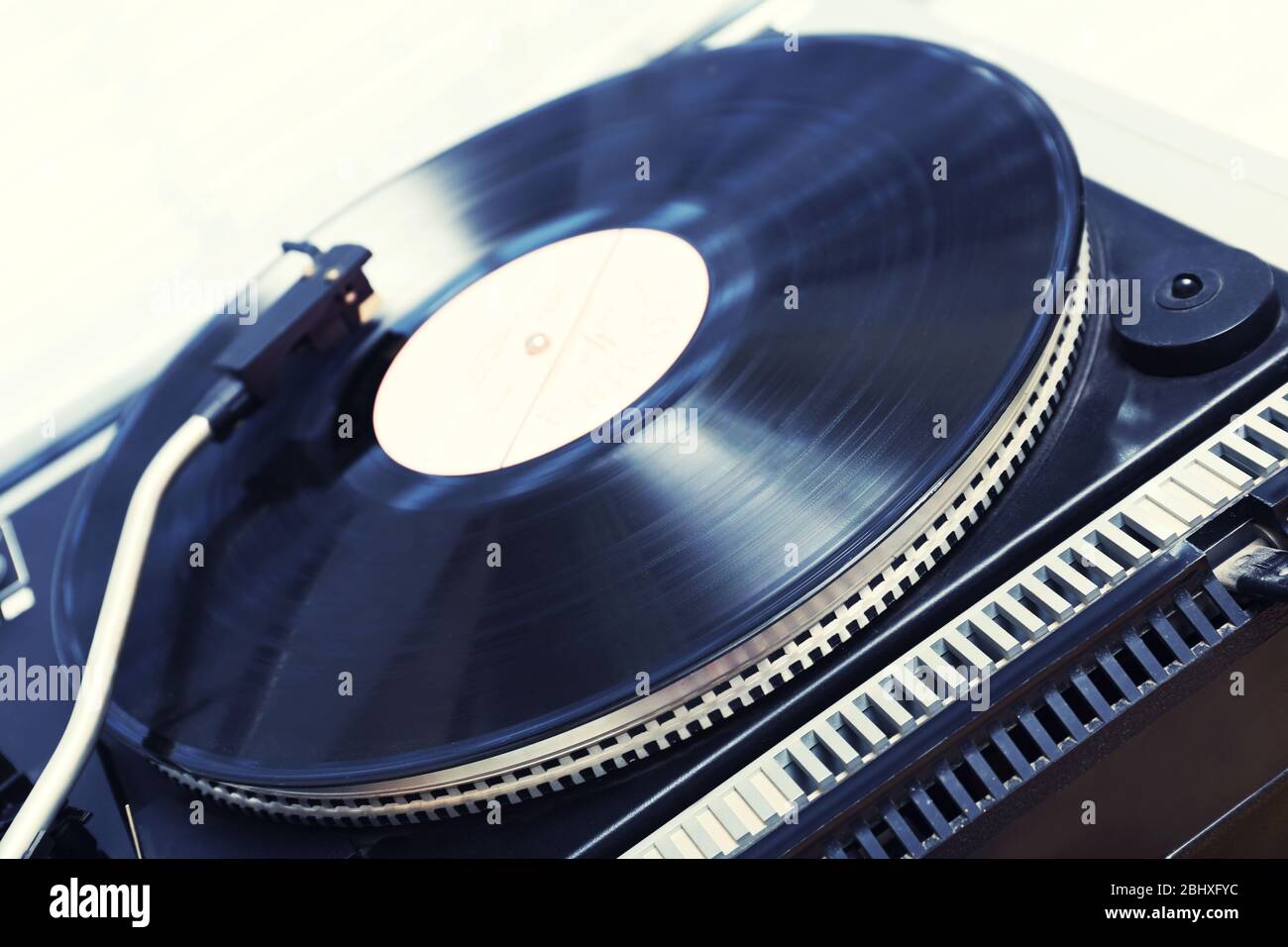 Gramophone with a vinyl record, closeup Stock Photo - Alamy