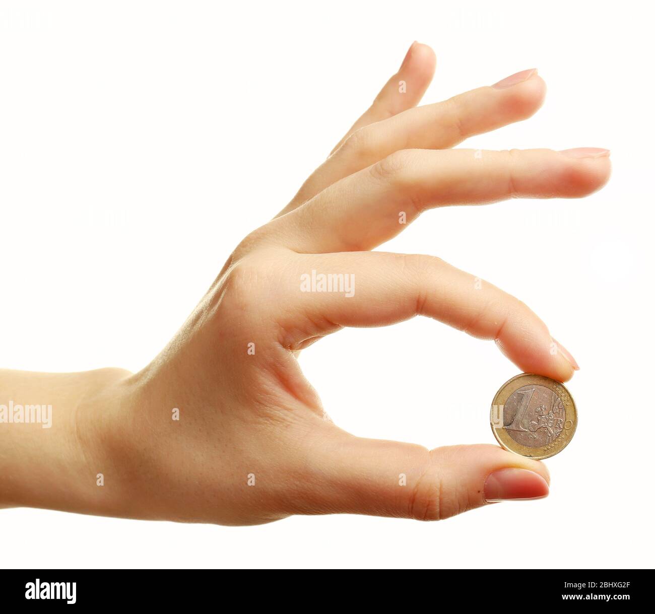 Female hand with coin isolated on white Stock Photo - Alamy
