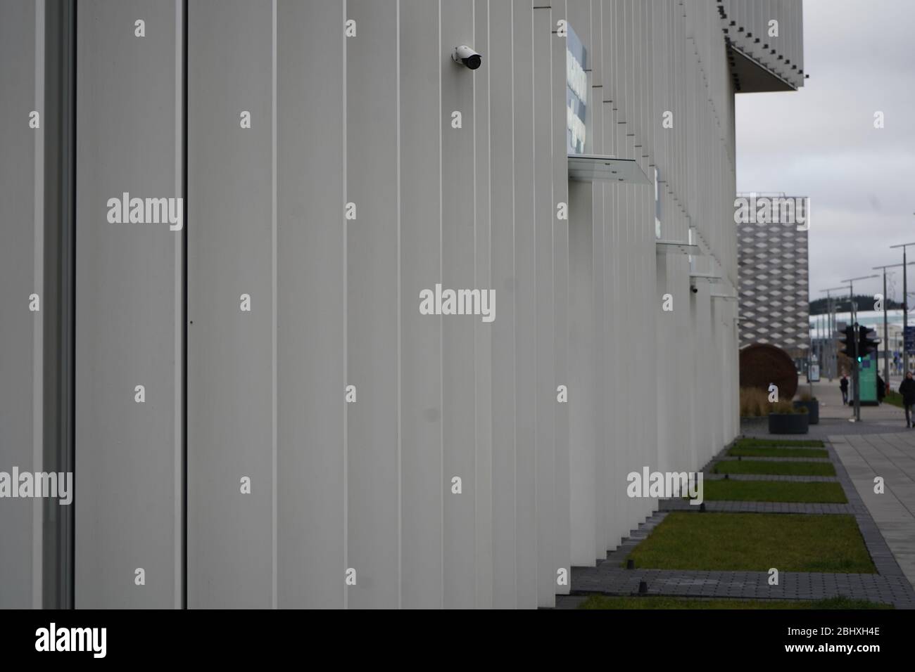 Modern building wall with security camera on it Stock Photo - Alamy