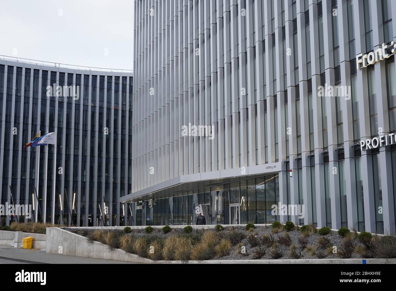 Modern office building with stripe like facade Stock Photo - Alamy