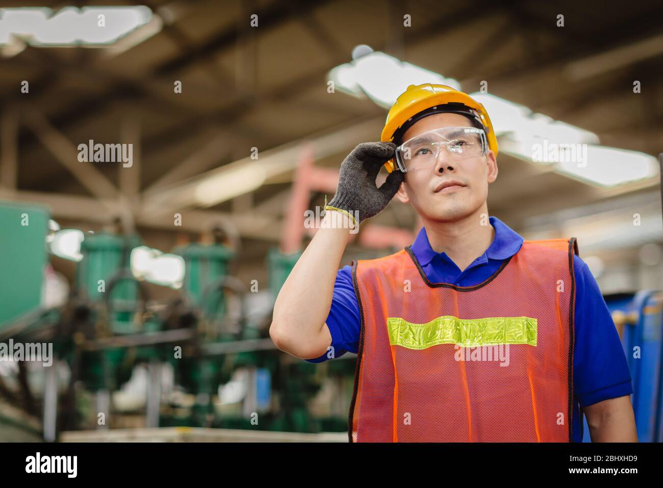 Portrait of smart engineer Asian Chinese happy labor worker handsome ...
