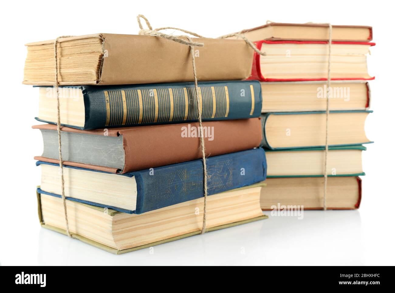 Stacks of books isolated on white Stock Photo - Alamy