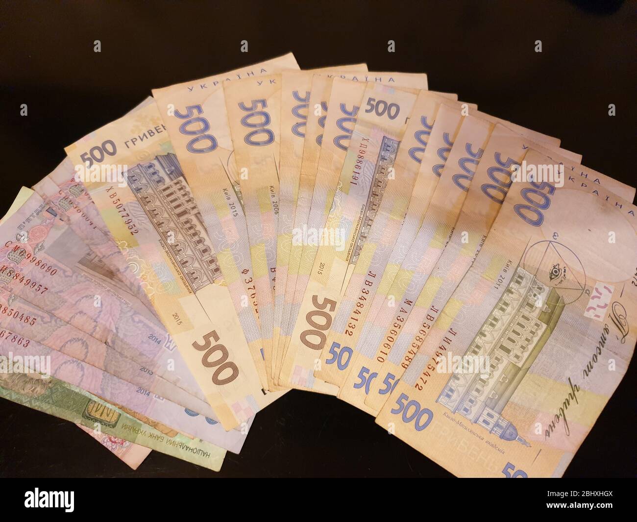 Ukraine money notes on the black surface Stock Photo - Alamy