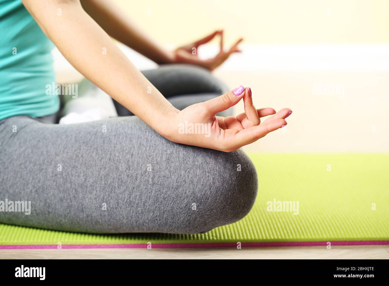 Hand yoga gesture on bright background Stock Photo - Alamy