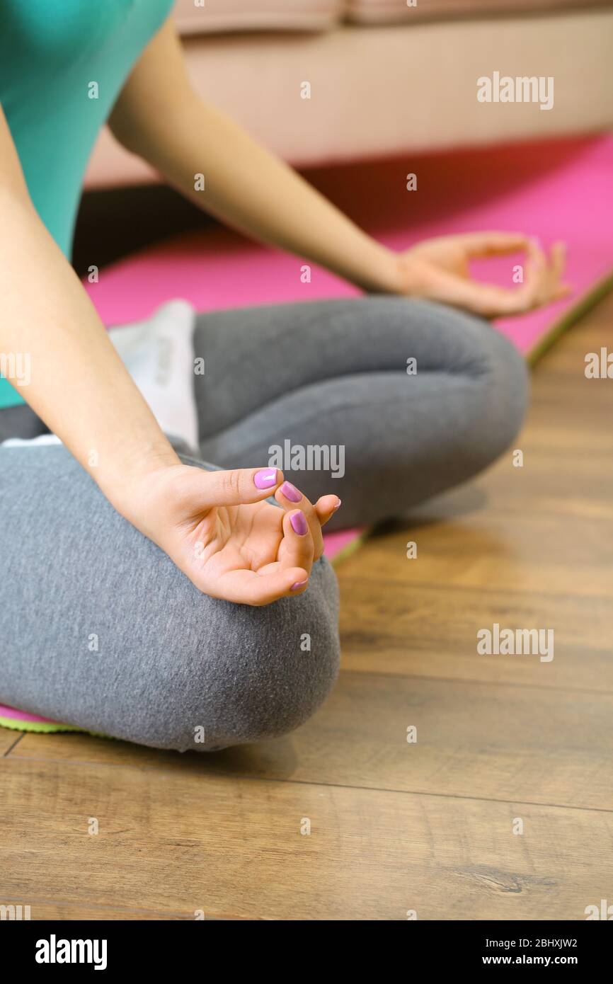 Hand yoga gesture on bright background Stock Photo - Alamy