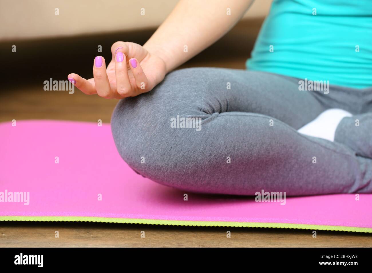 Hand yoga gesture on bright background Stock Photo - Alamy