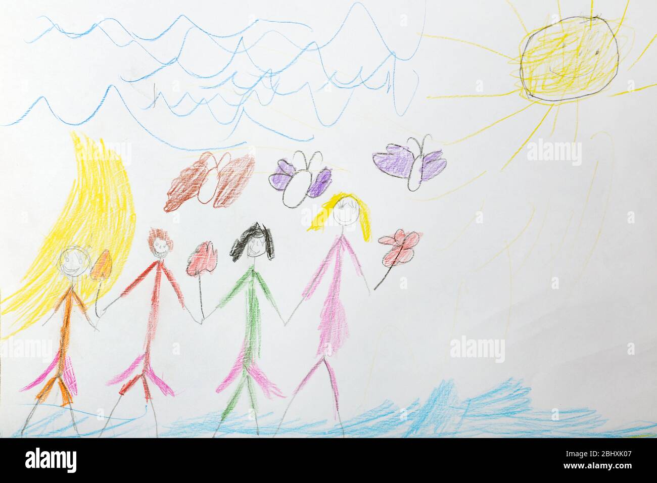 Kids drawing on white sheet of paper background Stock Photo - Alamy