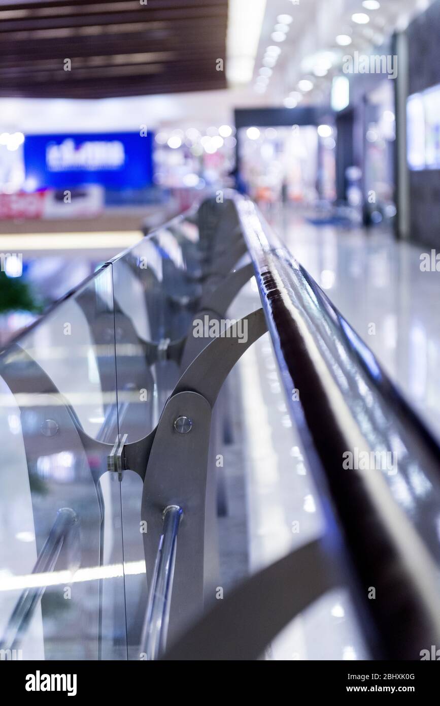 Close up view of handle on railing in the shopping mall Stock Photo - Alamy