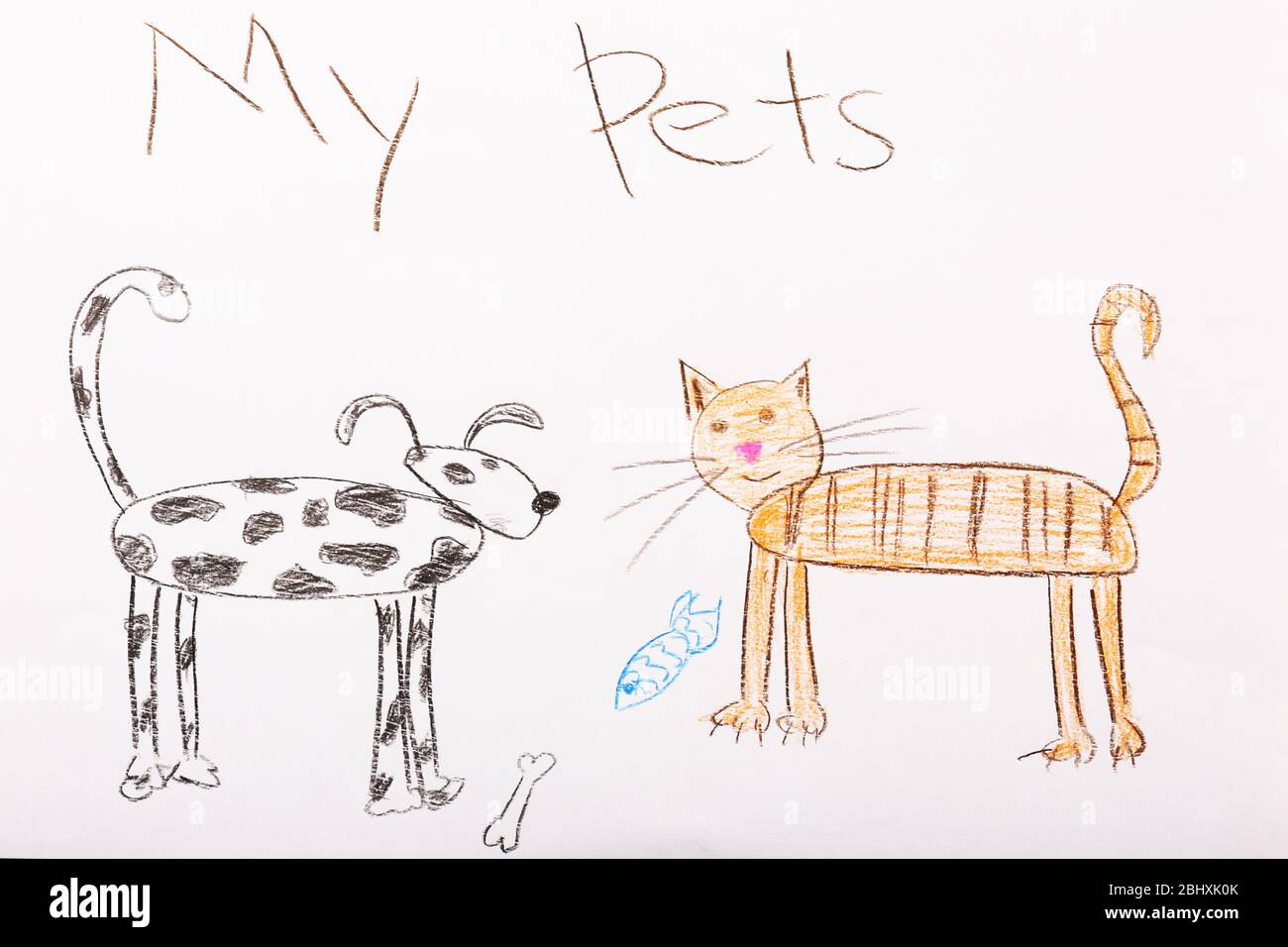 Kids drawing on white sheet of paper background Stock Photo - Alamy