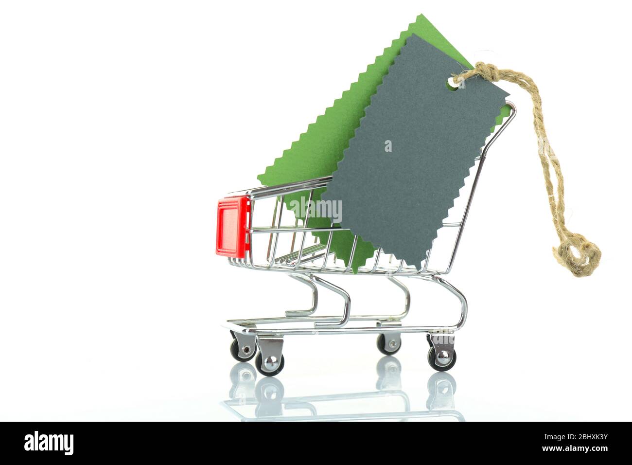 Blank tags in metal cart isolated on white Stock Photo - Alamy