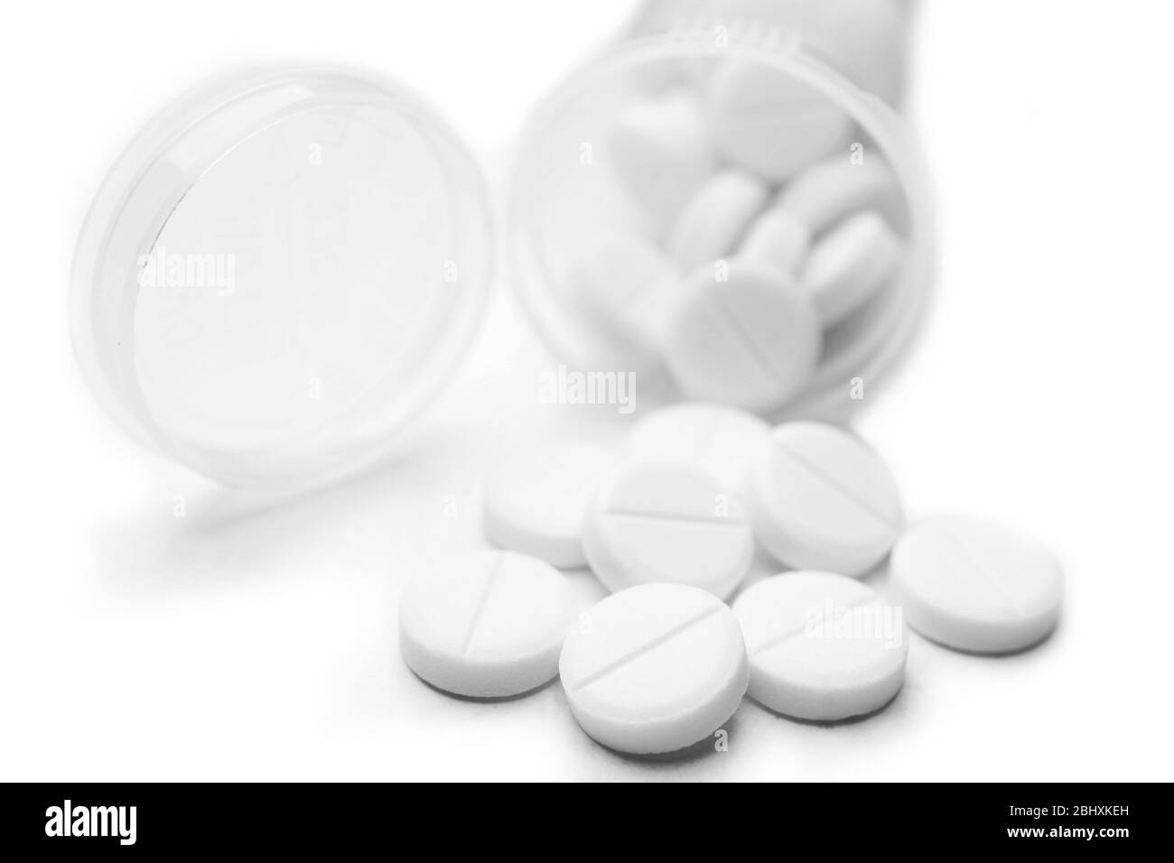 Pile of pills isolated on white Stock Photo - Alamy