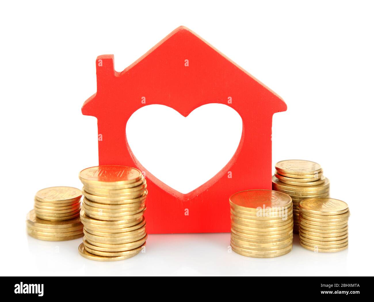 Model of house with coins isolated on white Stock Photo - Alamy