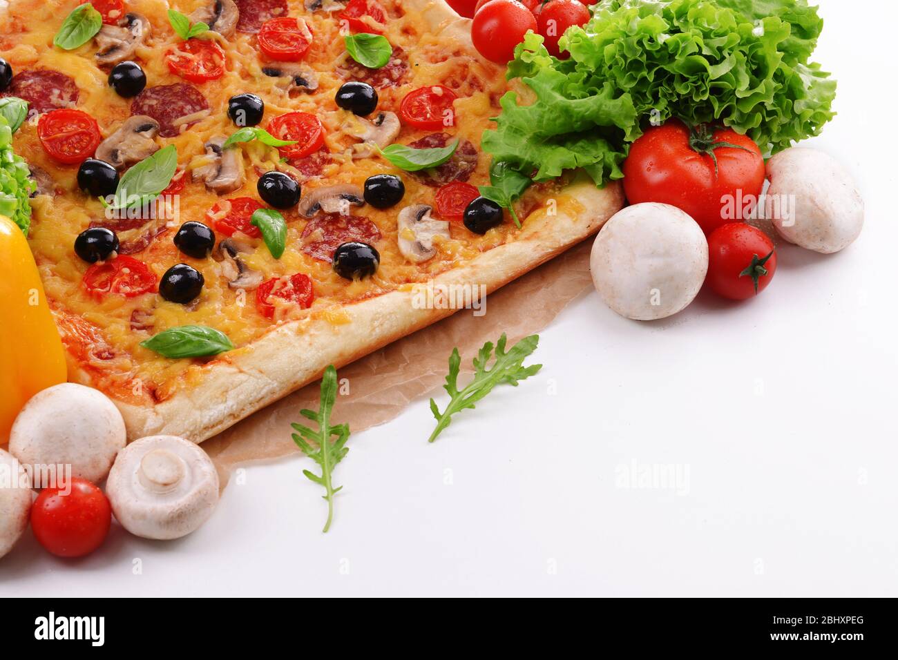 Delicious homemade pizza on white background Stock Photo - Alamy