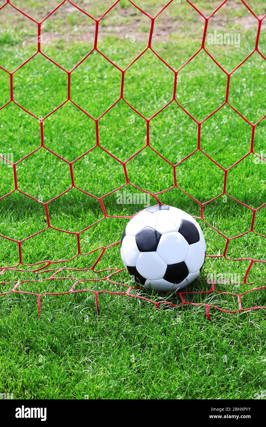 soccer ball in goal Stock Photo - Alamy