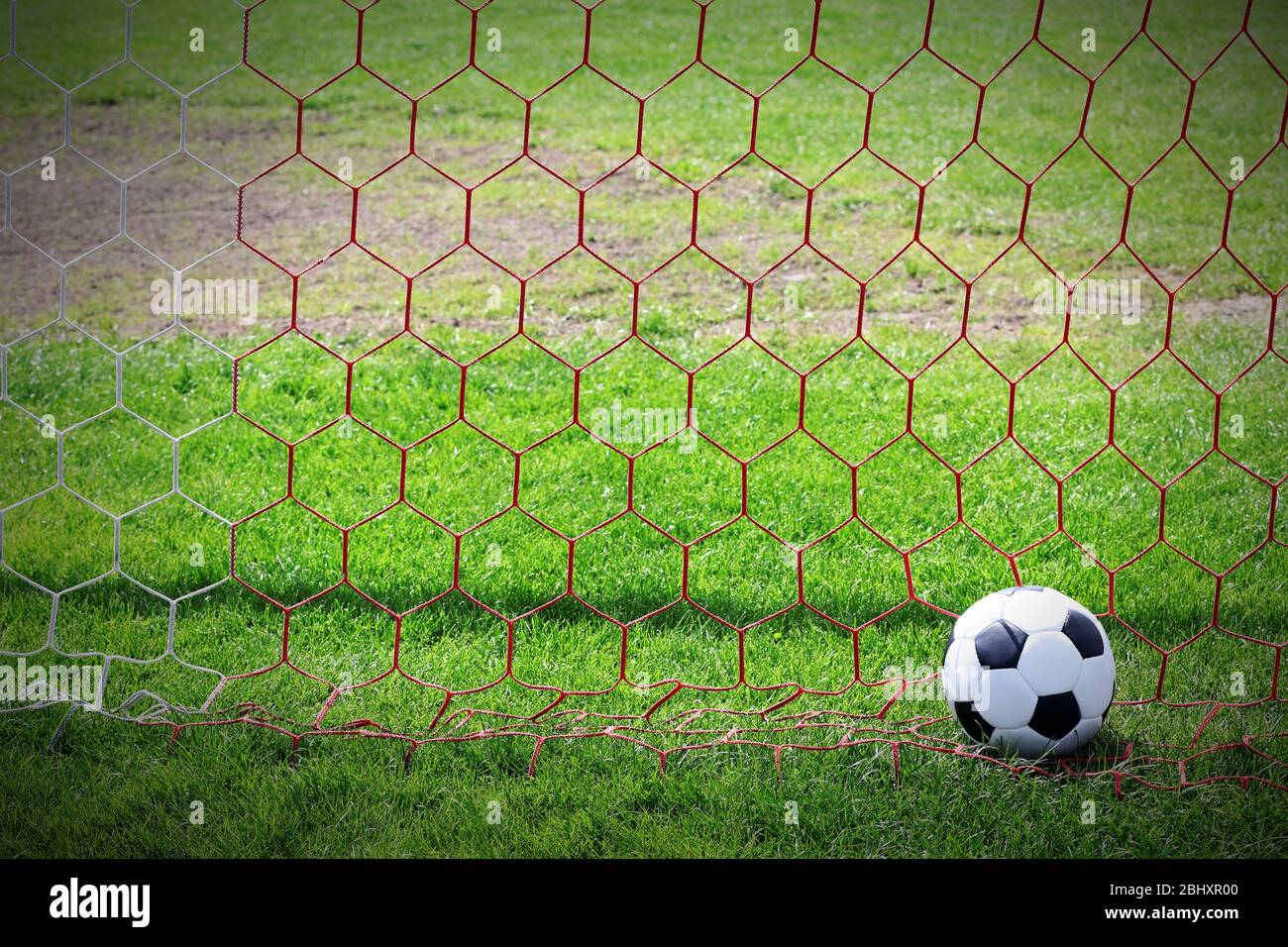 soccer ball in goal Stock Photo - Alamy