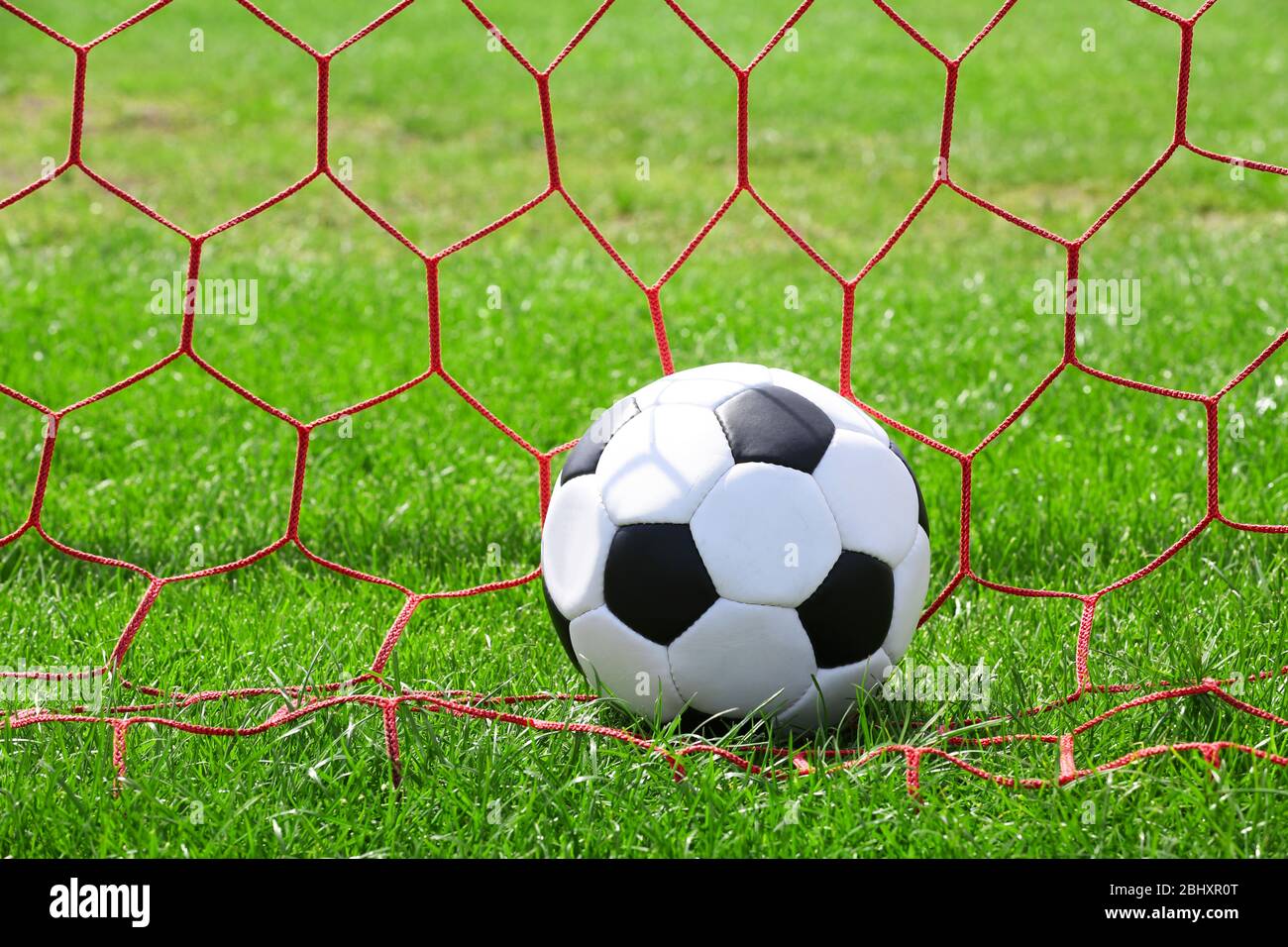 soccer ball in goal Stock Photo - Alamy