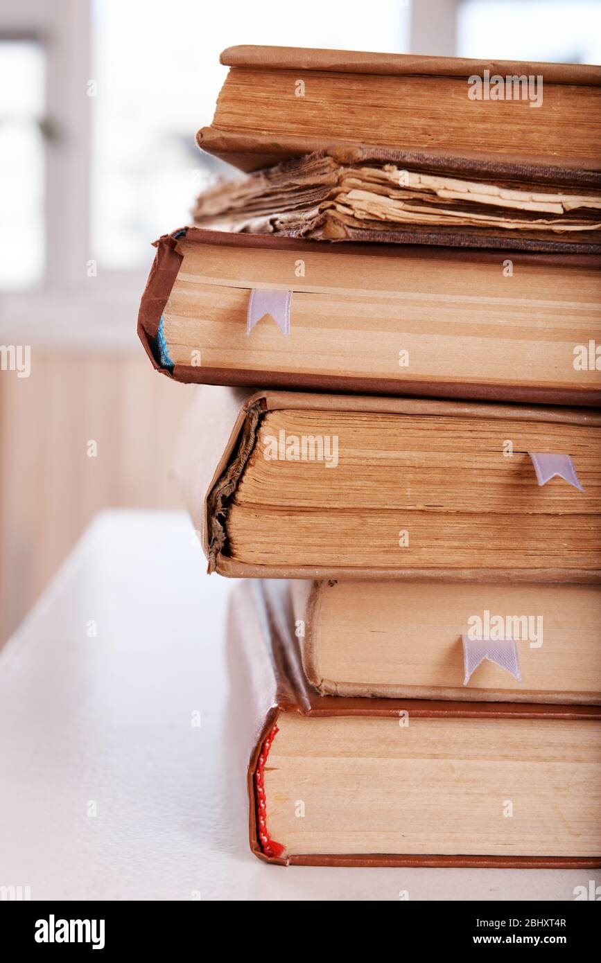 Stack of books on table close up Stock Photo - Alamy