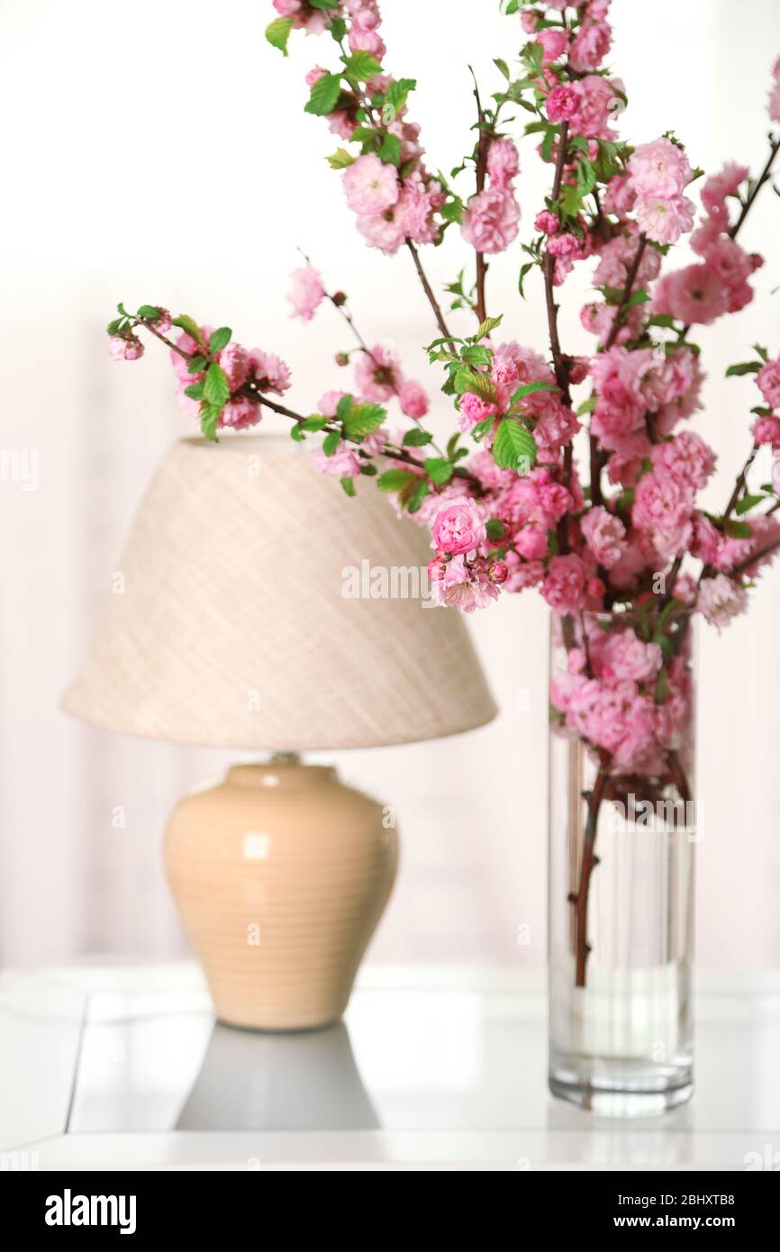 Spring bouquet in vase, on table, on home interior background Stock ...