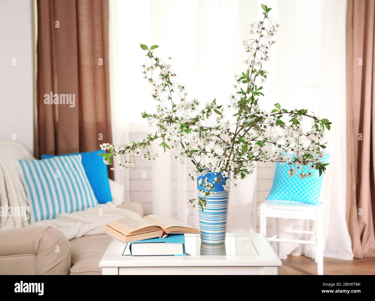 Spring bouquet in vase, on table, on home interior background Stock ...