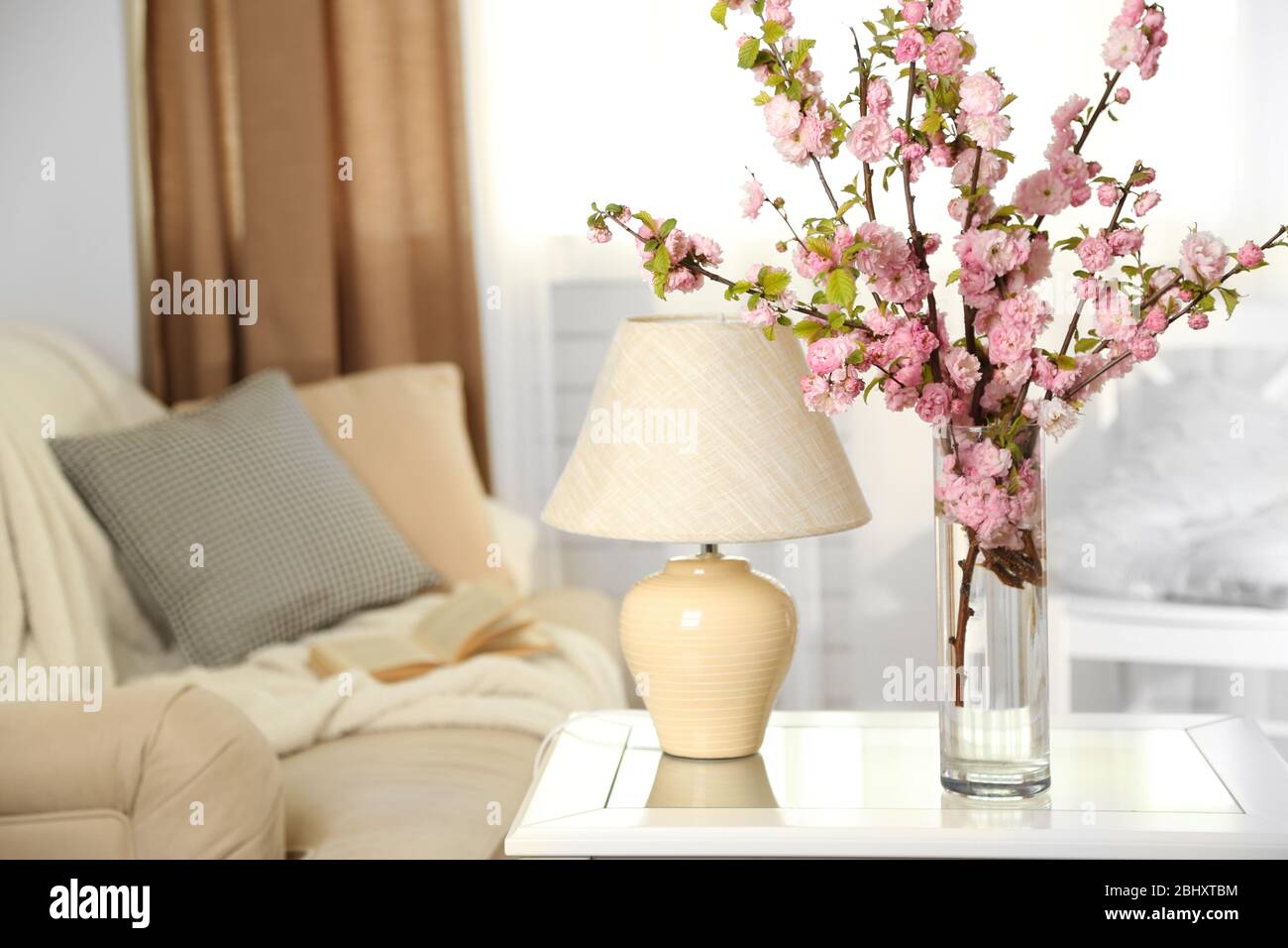 Spring bouquet in vase, on table, on home interior background Stock ...
