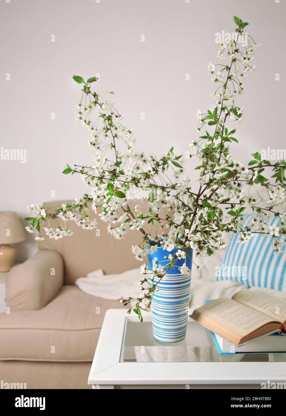 Spring bouquet in vase, on table, on home interior background Stock ...