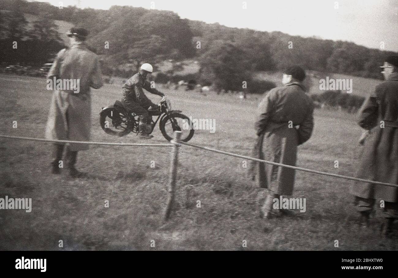 1950s, historical, a scrambler on his motorcycle of the era racing ...