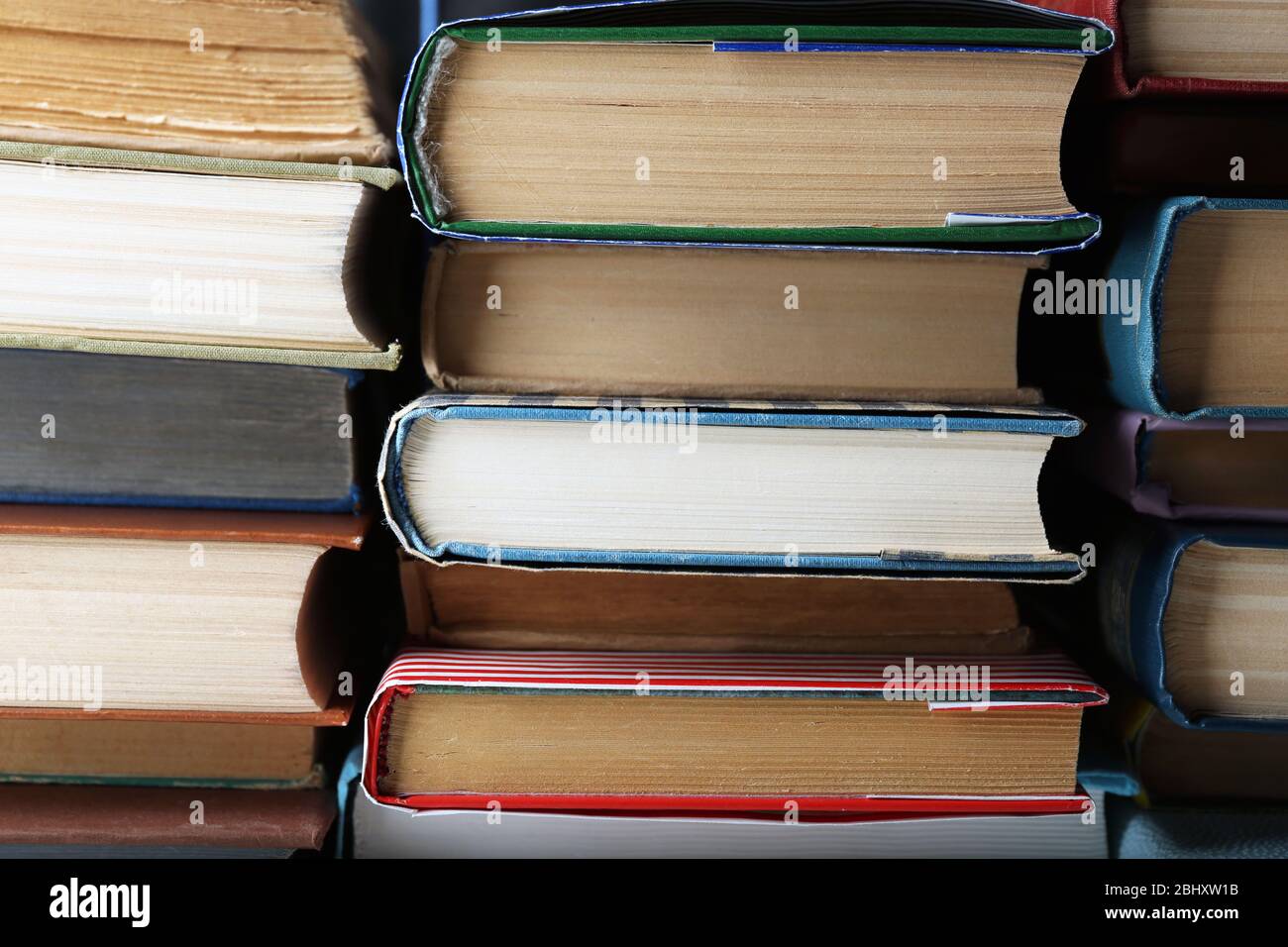 Stack of books background Stock Photo - Alamy