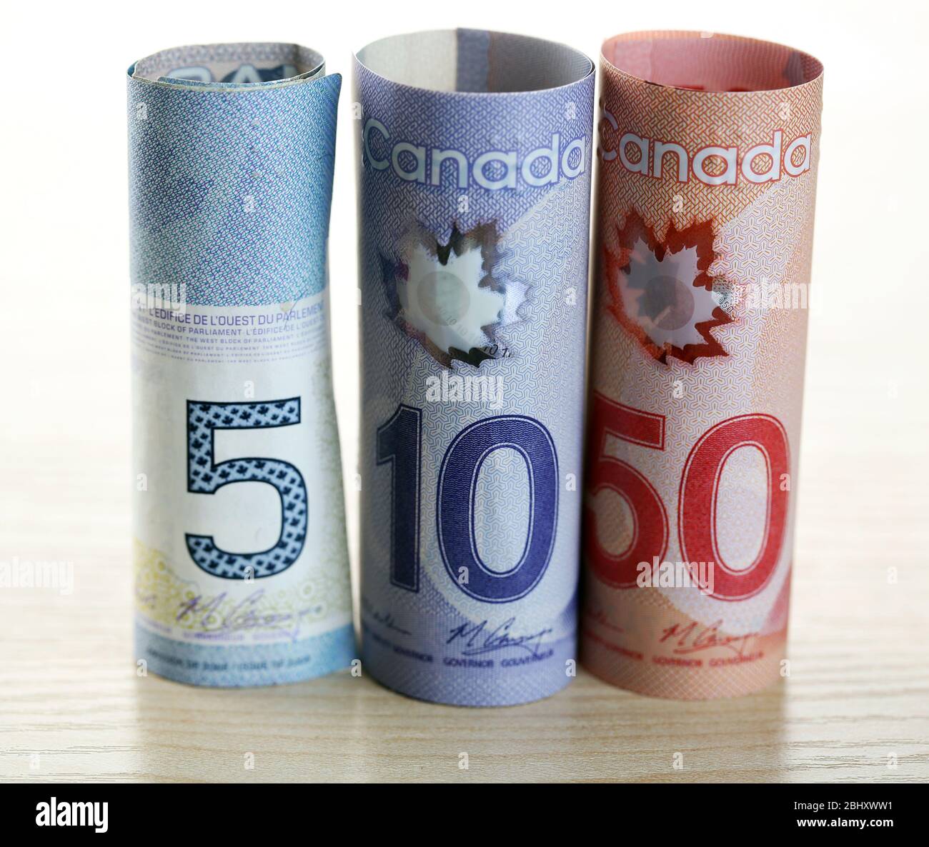 Canadian money roll hi-res stock photography and images - Alamy