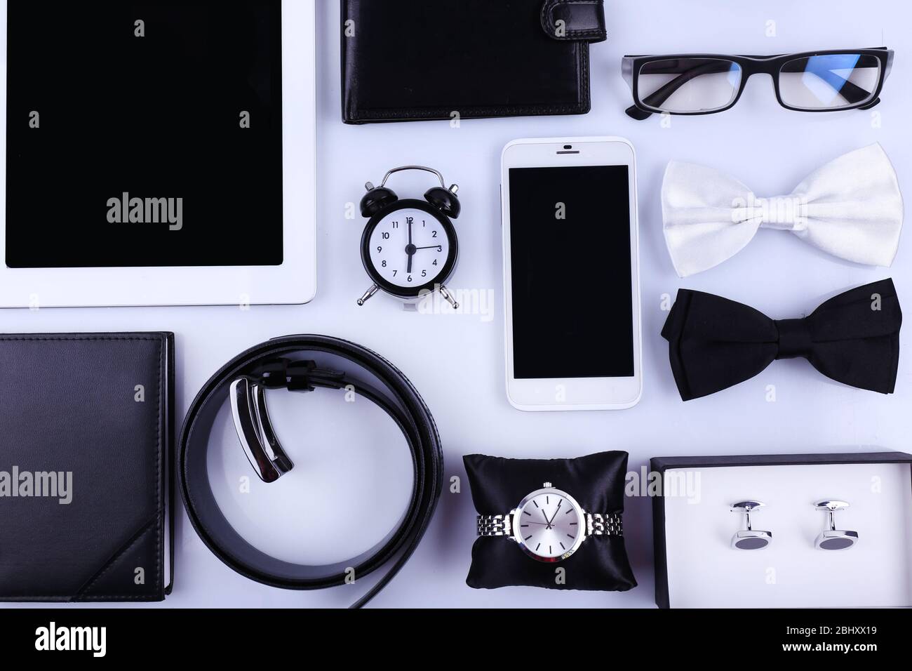 Essentials fashion man objects on light background Stock Photo - Alamy