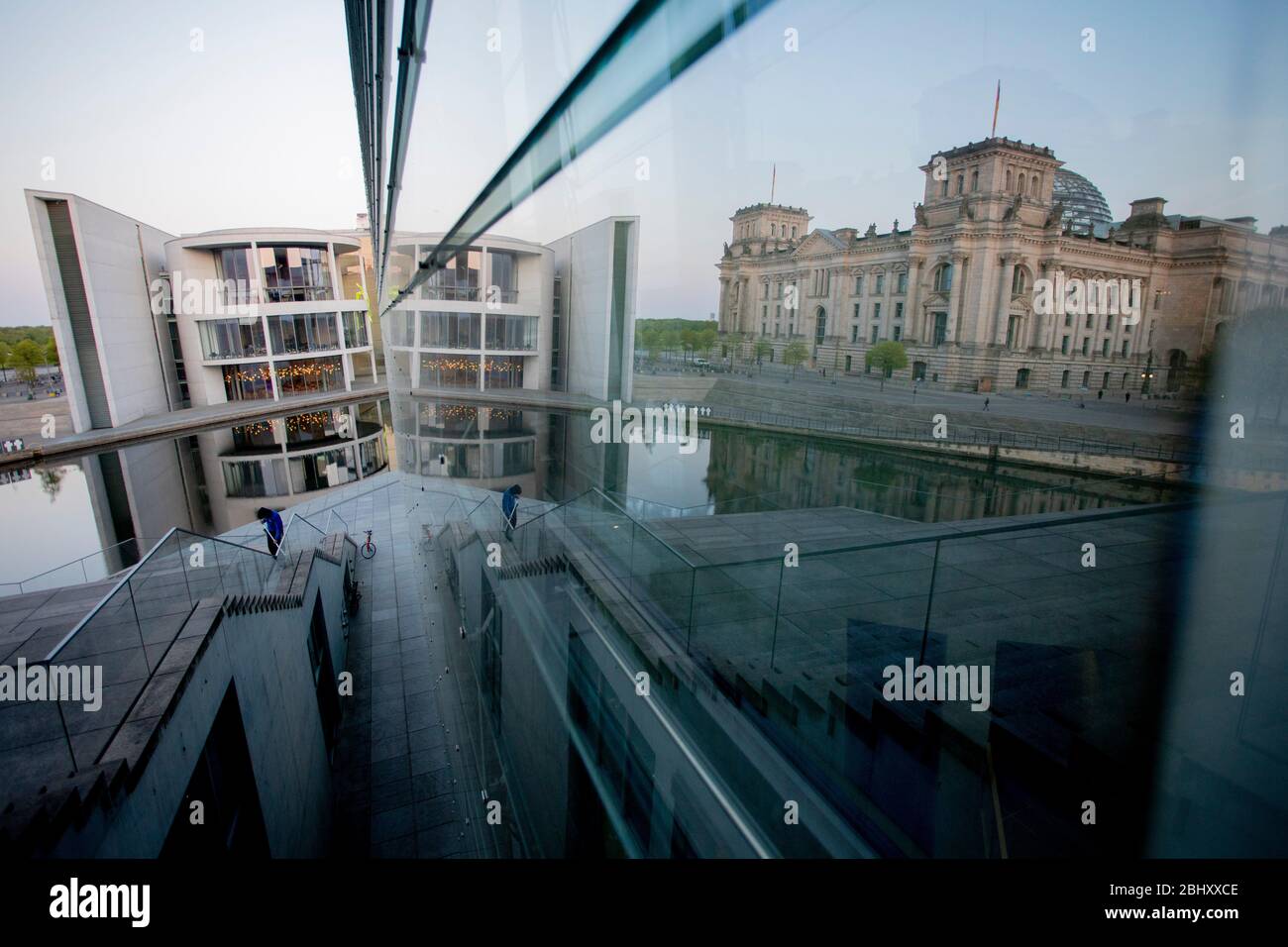 Berlin, Germany. 28th Apr, 2020. The Reichstag building (r) and Paul ...