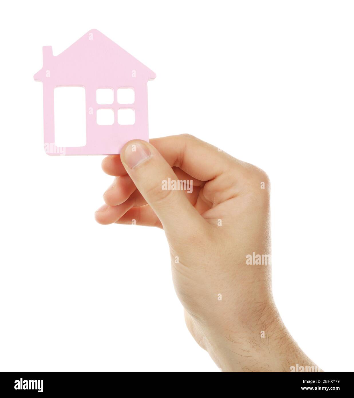 Female hand holding house isolated on white Stock Photo - Alamy