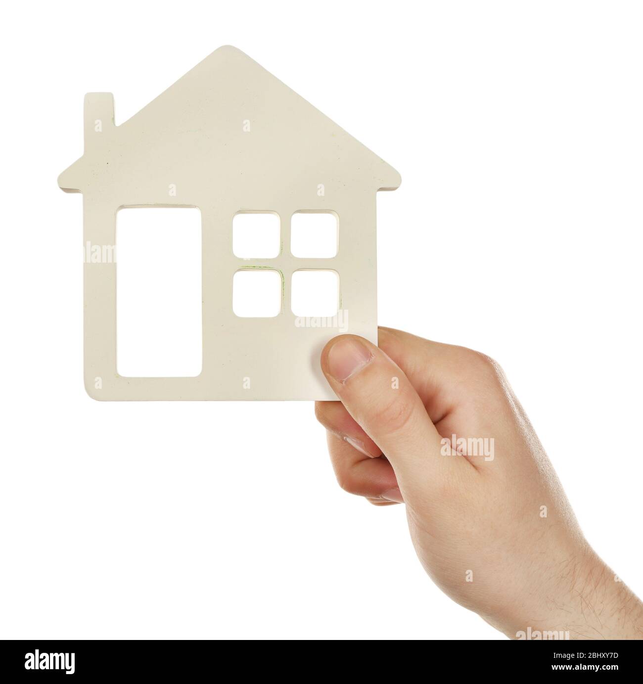 Female hand holding house isolated on white Stock Photo - Alamy