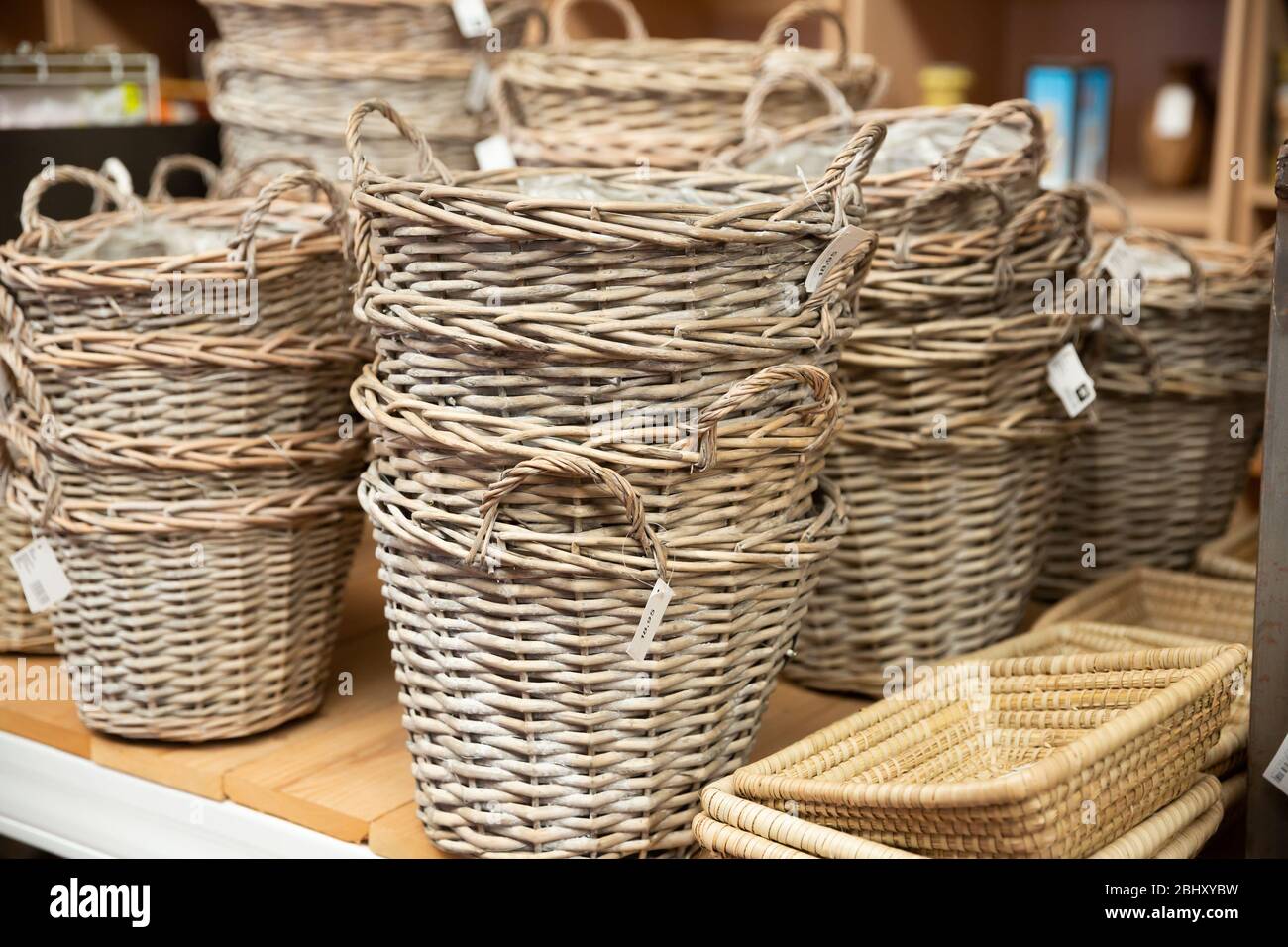 Showcase of home decor shop with various decorative handmade wickerwork ...
