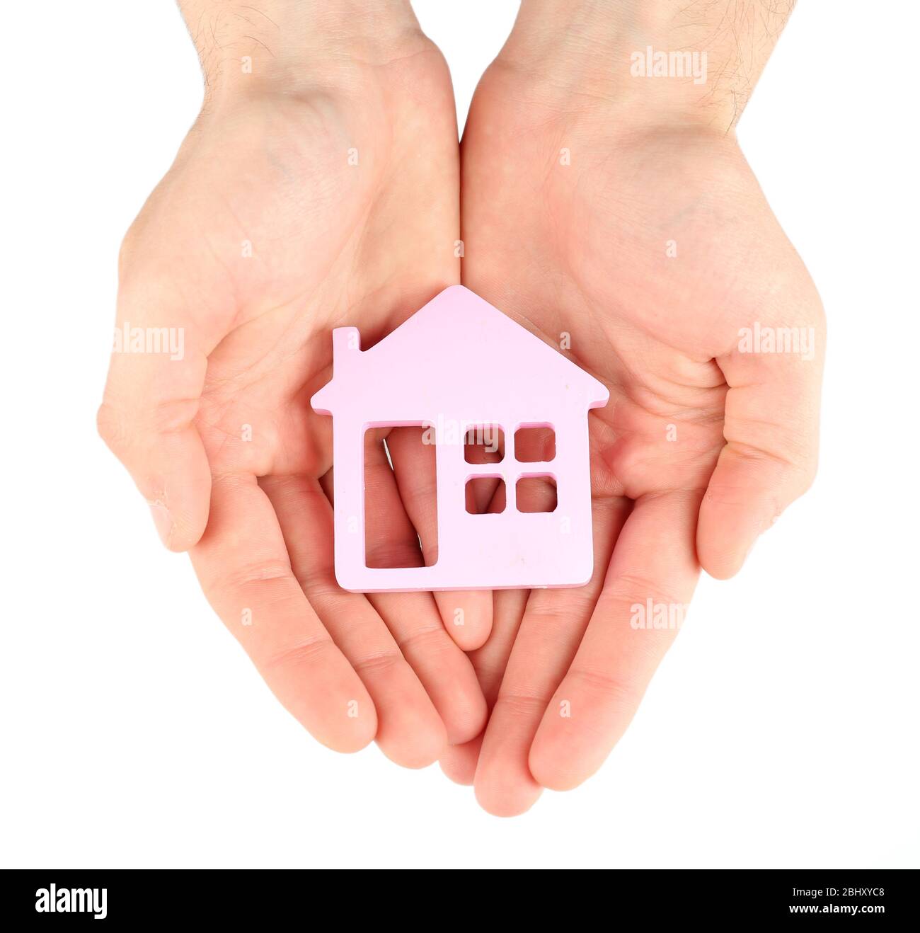 Female hands holding house isolated on white Stock Photo - Alamy