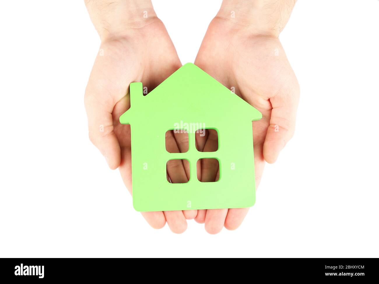 Female hands holding house isolated on white Stock Photo - Alamy