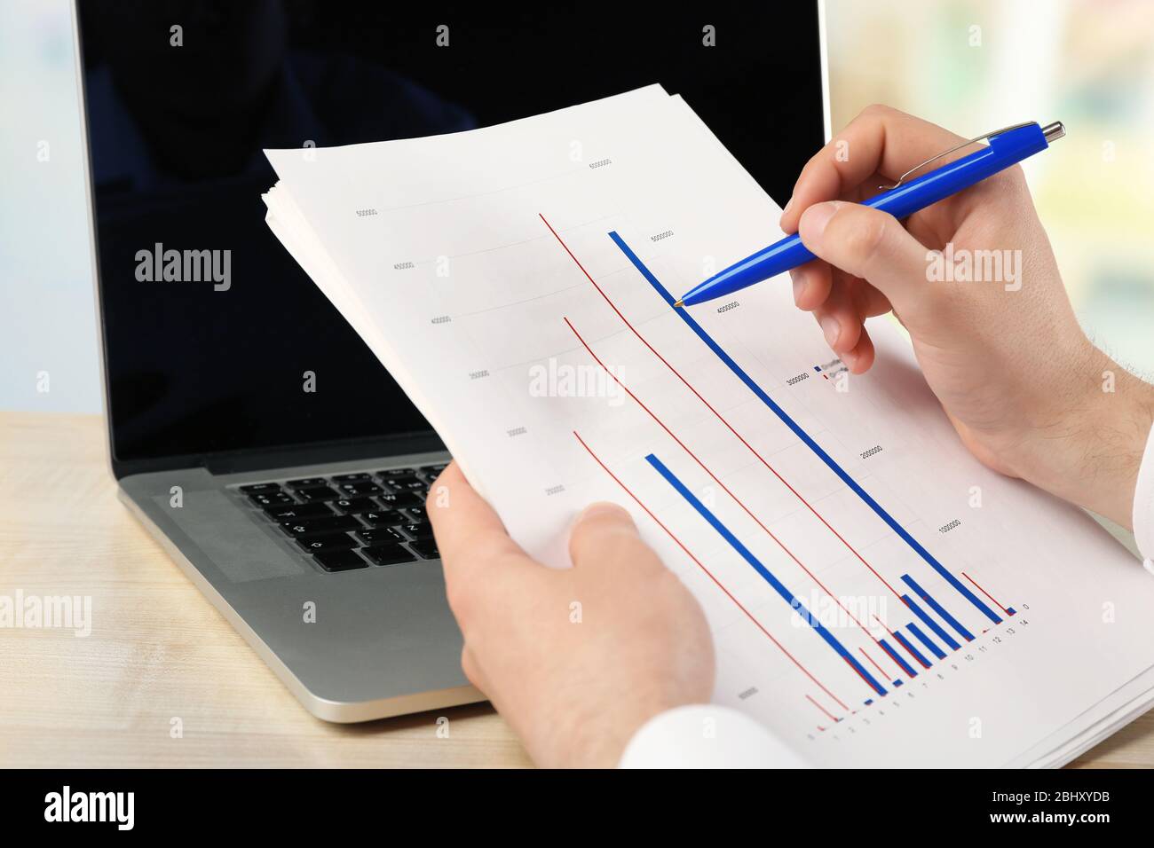 Businessman analyzing charts hi-res stock photography and images - Alamy